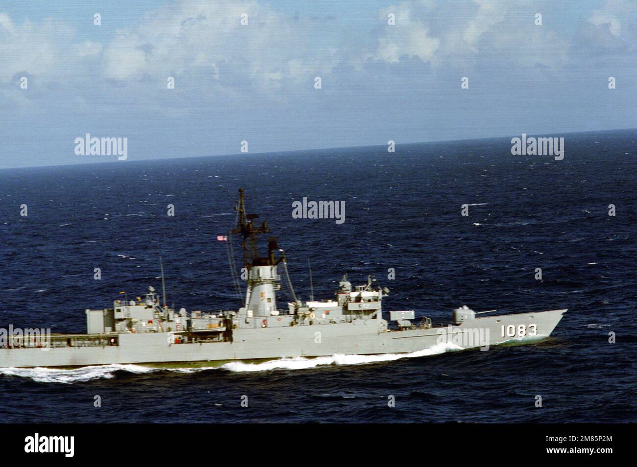 A starboard beam view of the frigate USS COOK (FF 1083) underway ...