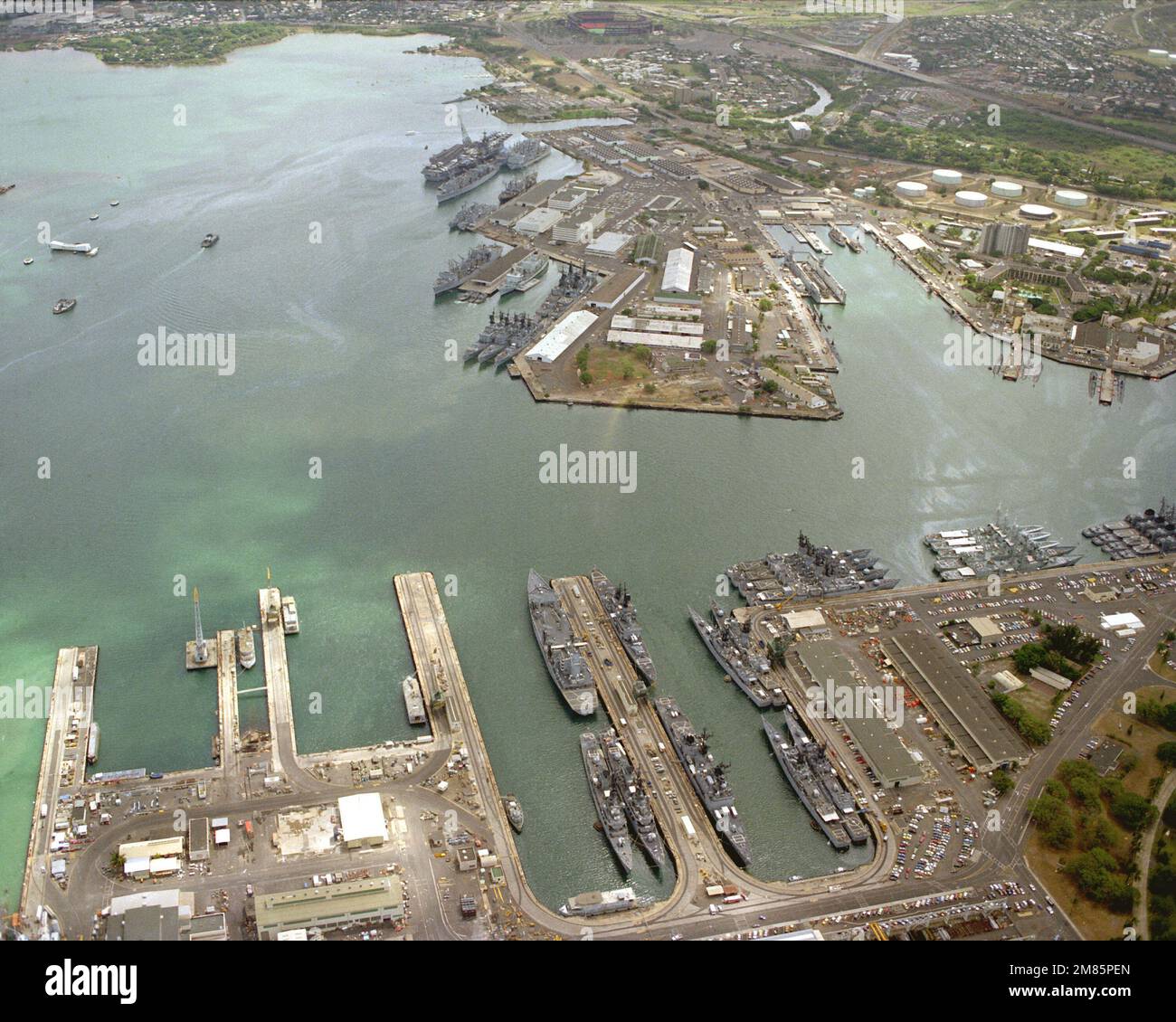 An aerial view of the harbor, looking east, northeast, as various U.S ...