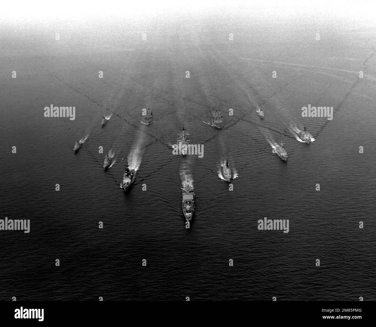 An aerial bow view of the first battleship battle group to deploy to ...