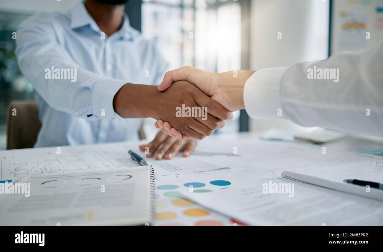 Handshake, office and business people with corporate deal, agreement or partnership with success ...