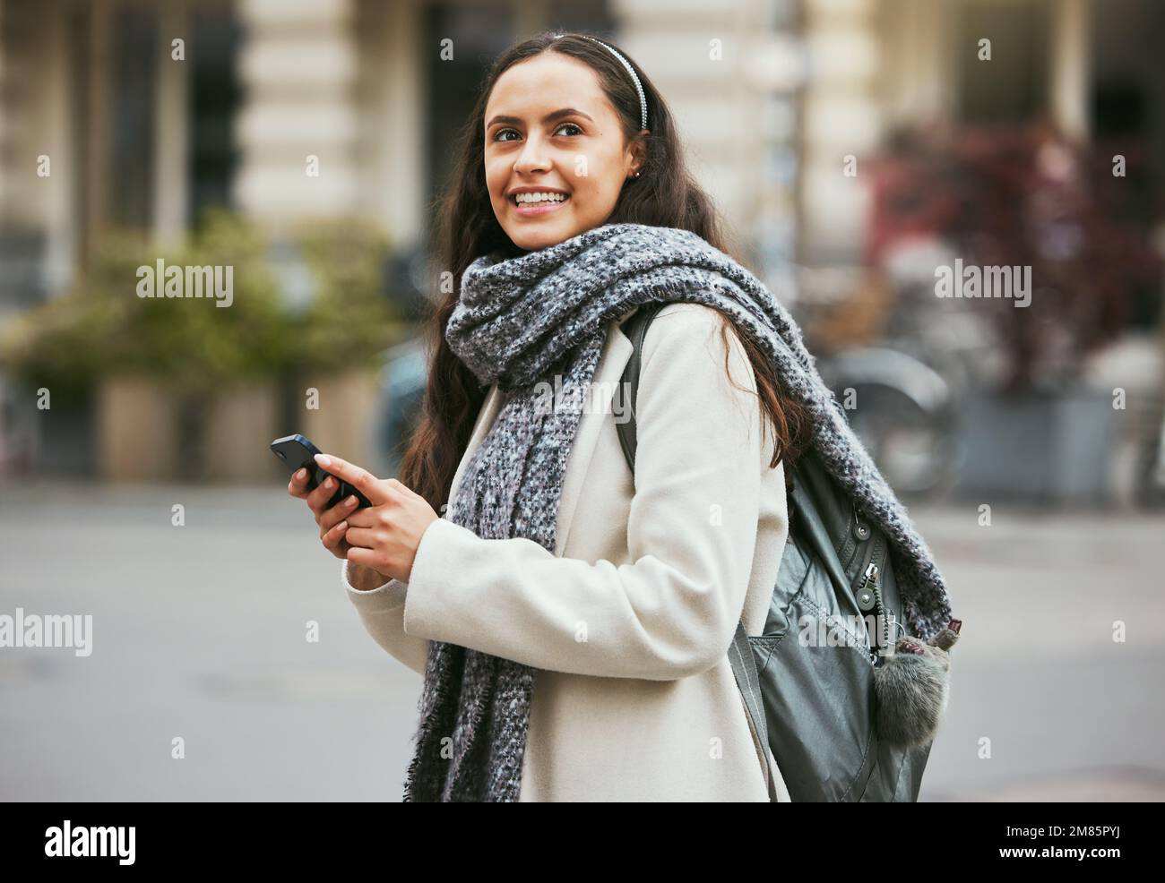 Walking, phone and woman travel on city sidewalk, street road or on ...