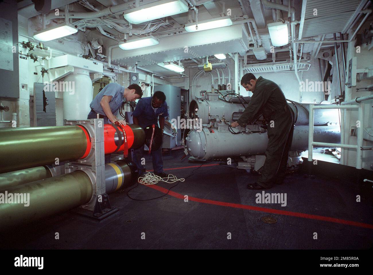 A crew member explains basic handling principles for the Mark 46 ...