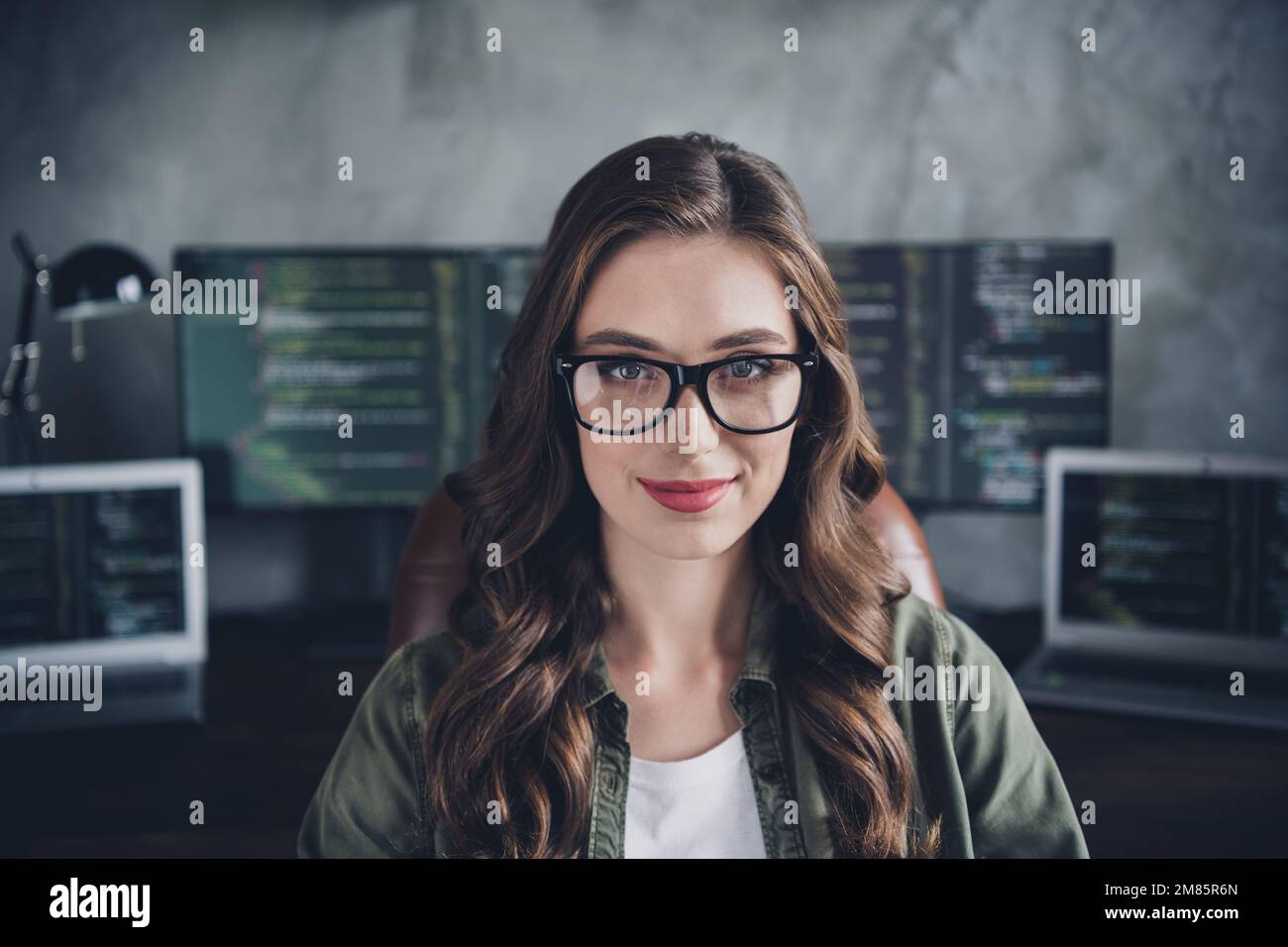 Photo of positive cheerful lady freelancer wear glasses typing code ...
