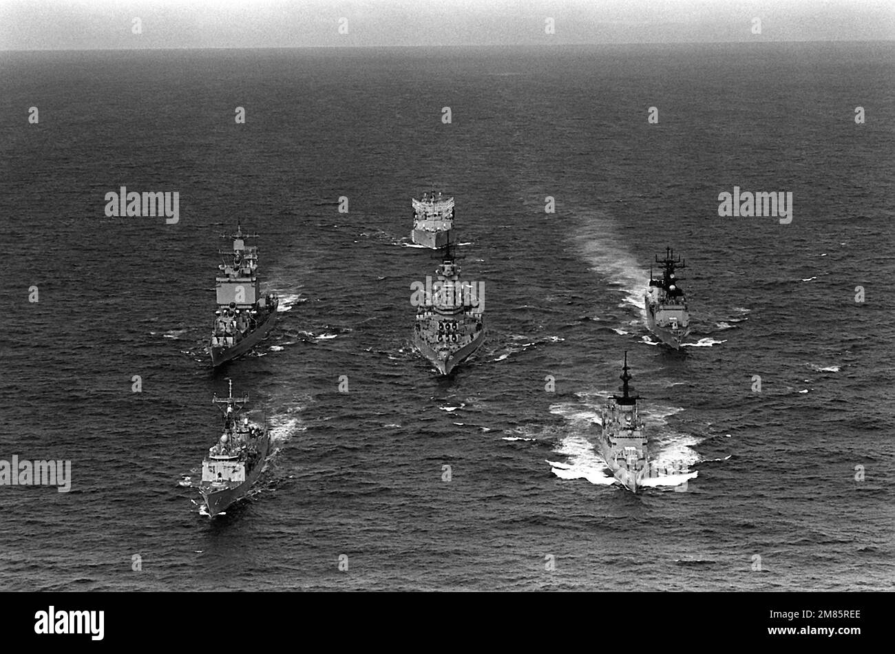 An aerial bow view of the first battleship battle group to deploy to ...