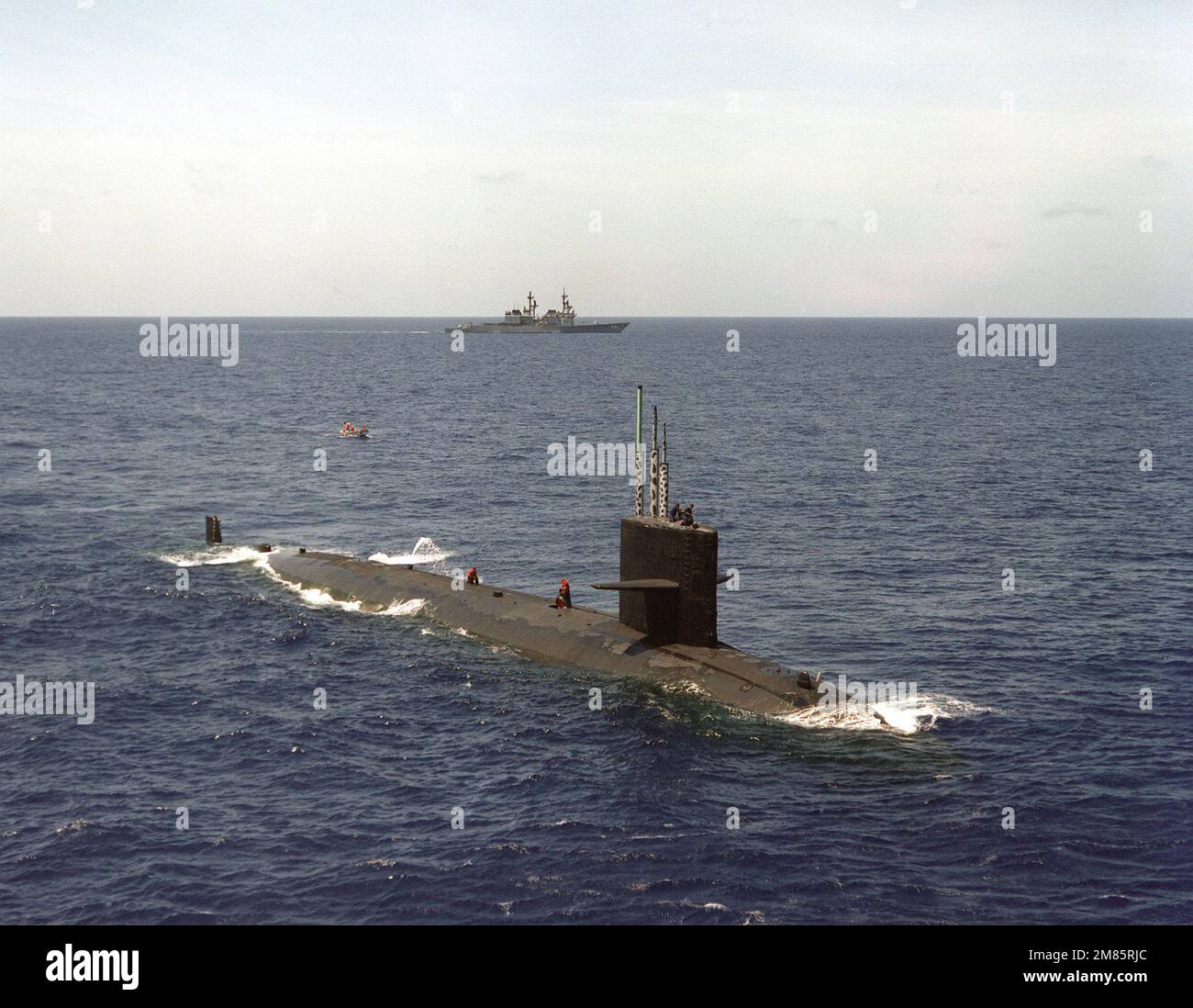 A starboard bow view of the nuclear-powered attack submarine USS ...