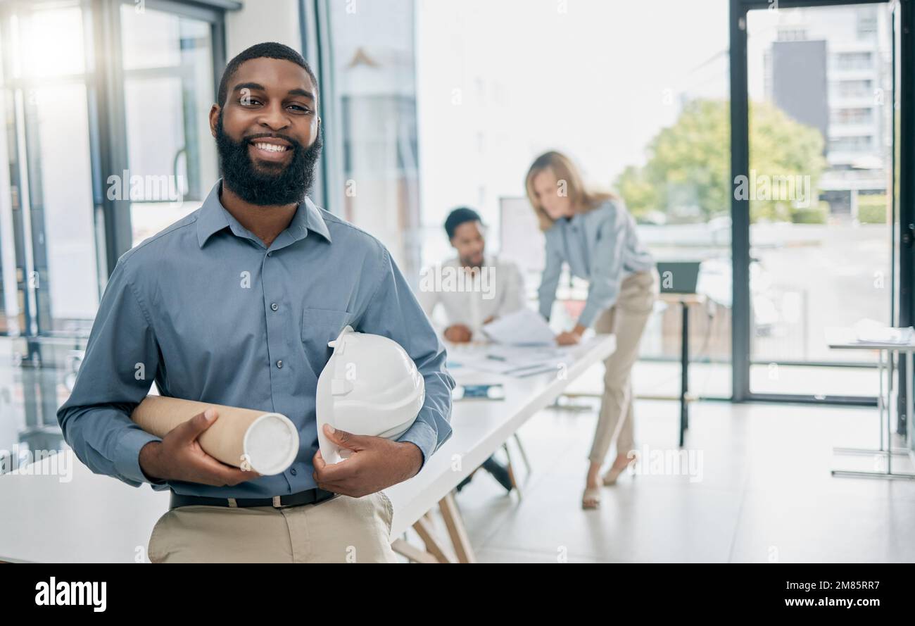 Portrait, black man and engineer in office, hard hat and blueprints for ...