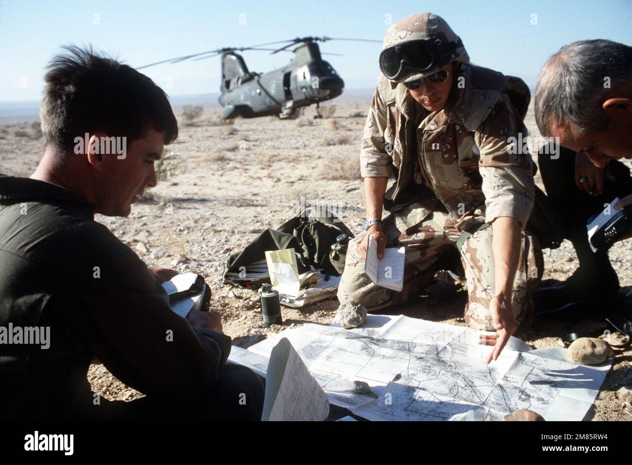 An air officer from the 1ST Battalion, 4th Marines, helps pilots of ...