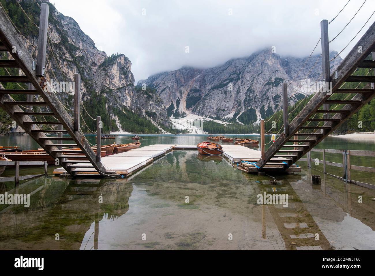 Ladders down to the jetty to hire boats at Lago di Braies in the ...