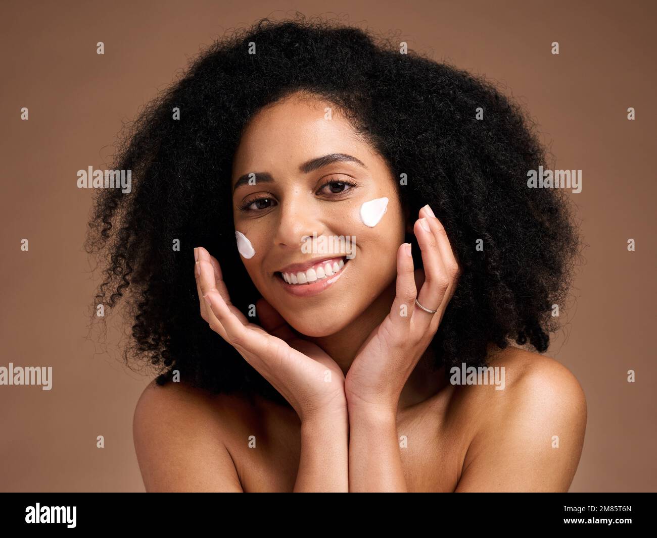 Beauty, sunscreen and face of African woman in studio for facial ...