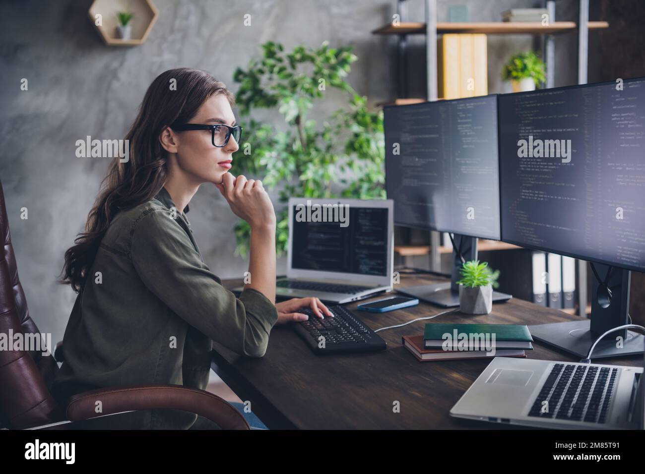 Profile side photo of smart focused minded lady solve work issue ...