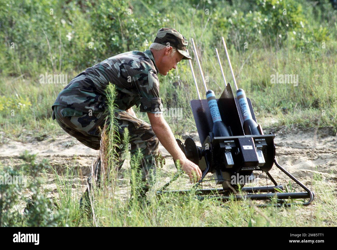 MASTER Sgt. Chester Davis, 16th Special Operations Squadron, sets up a ...