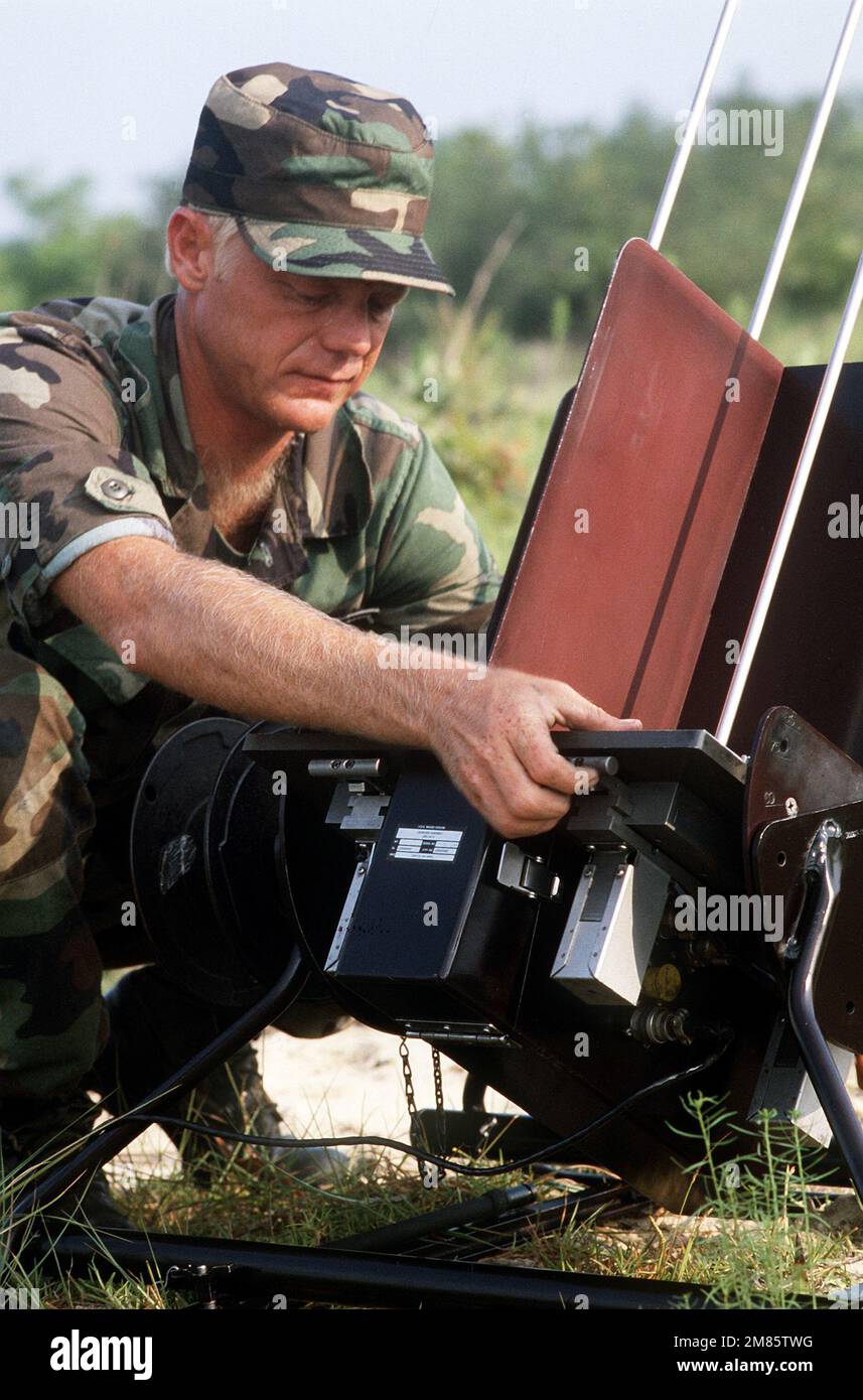 MASTER Sgt. Chester Davis, 16th Special Operations Squadron, sets up a ...