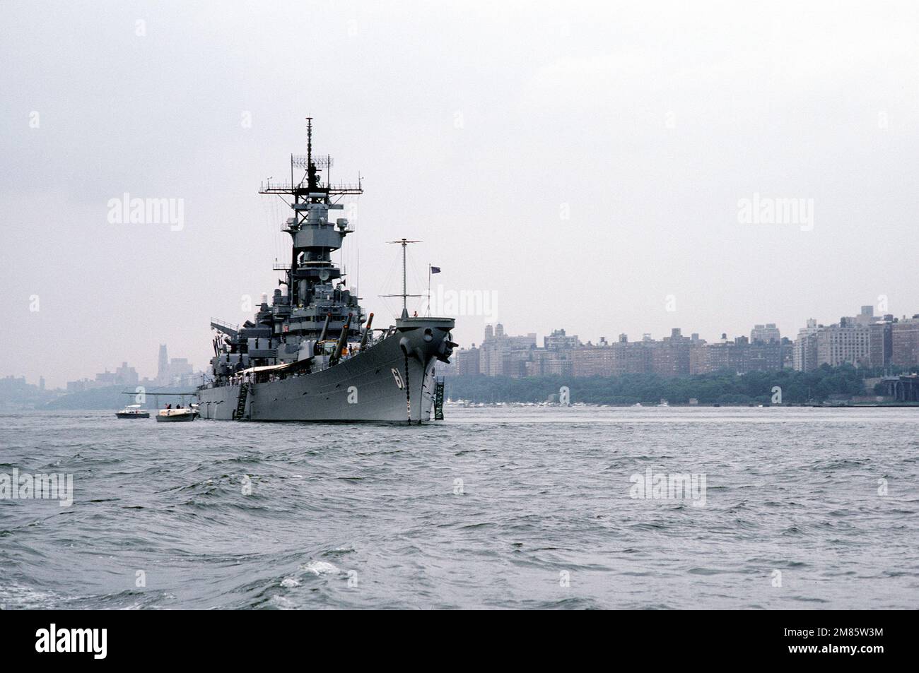 A starboard bow view of the battleship USS IOWA (BB-61) anchored in the ...