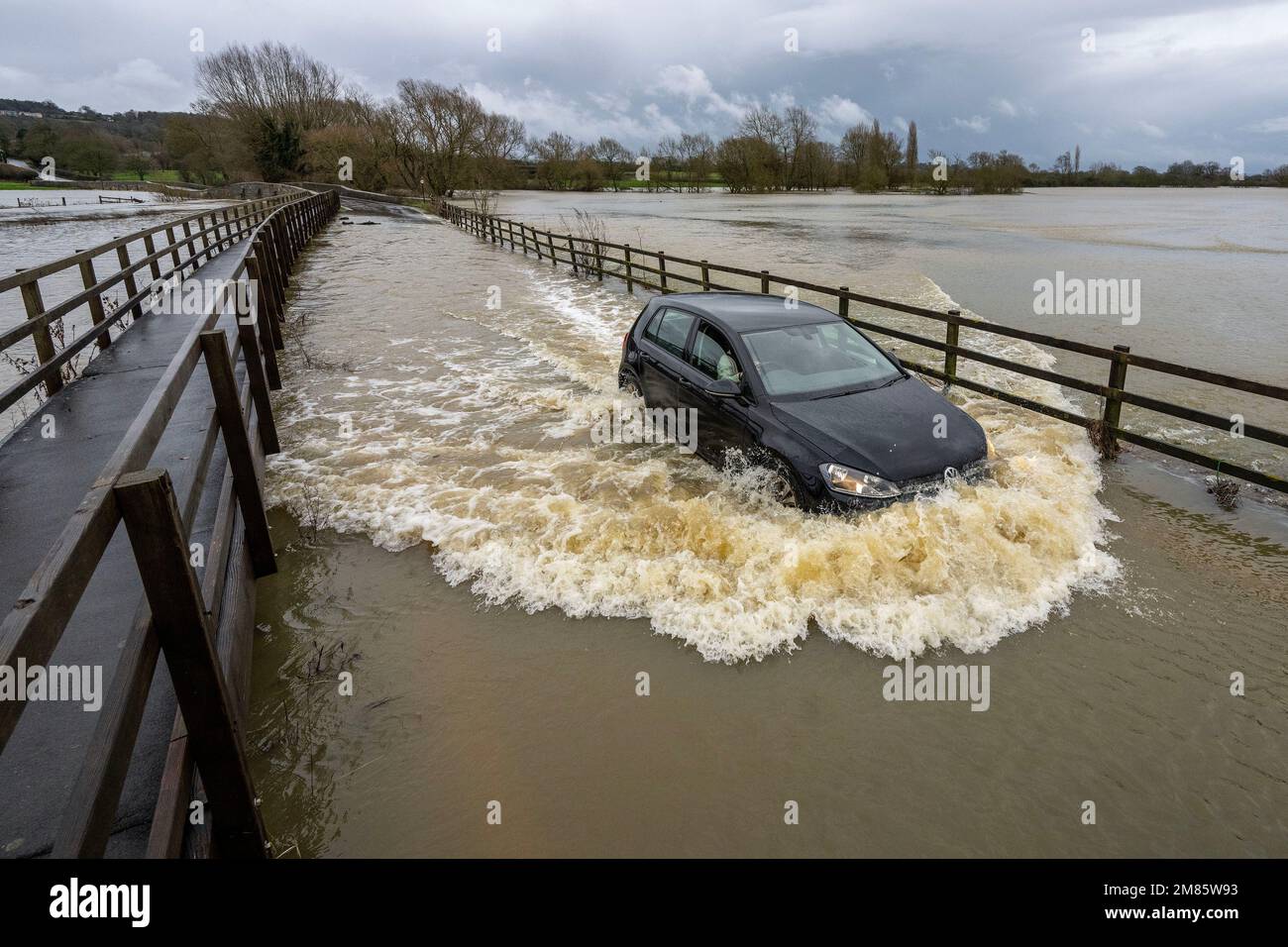 Flooding over a road in heavy rain hi-res stock photography and images ...