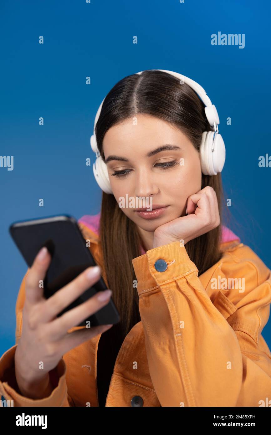 Beautiful girl in headphones typing hi-res stock photography and images ...