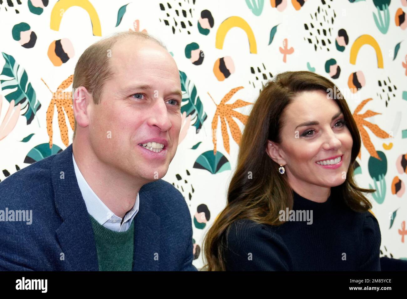 Britain's Kate, Princess of Wales, and Prince William listen to young ...
