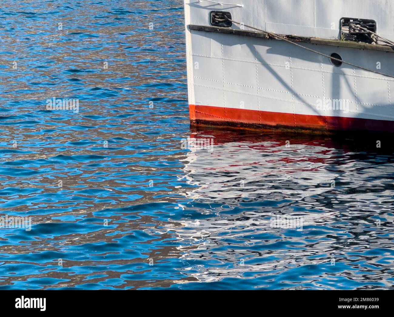 Detail of boat on water Stock Photo - Alamy