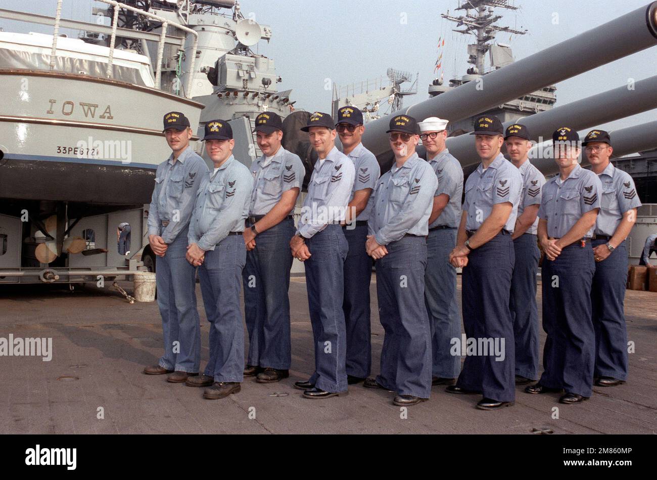 Eleven first class petty officers pose for a photo aboard the ...