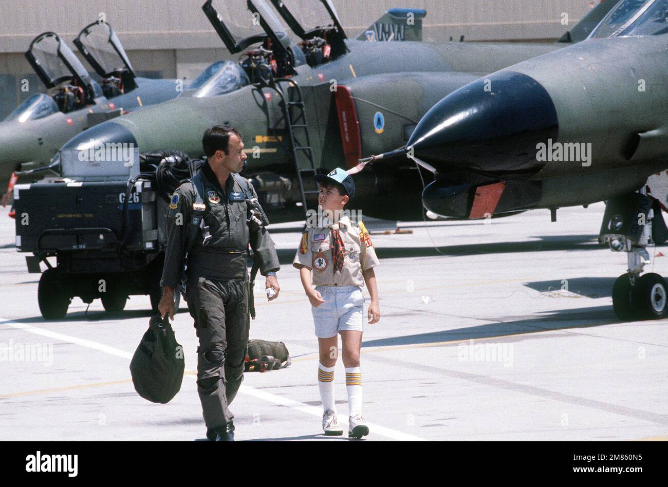 MAJ. Paul Gardner, 563rd Tactical Fighter Squadron, gives Cub Scout ...