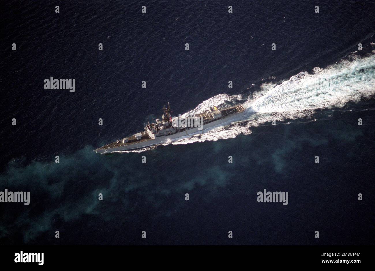 An aerial port bow view of the guided missile frigate USS RAMSEY (FFG-2 ...