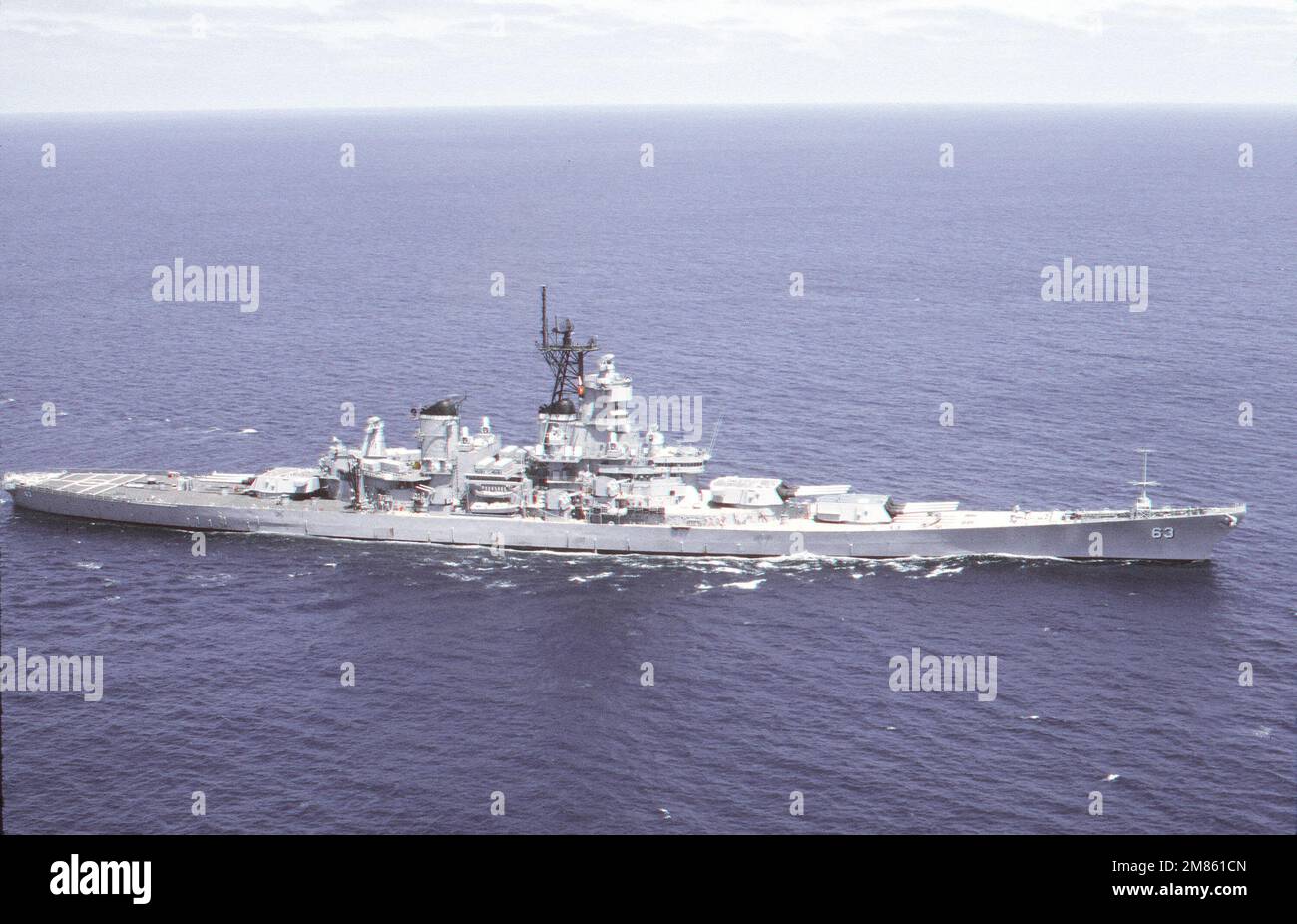 A starboard beam view of the battleship USS MISSOURI (BB-63) underway ...
