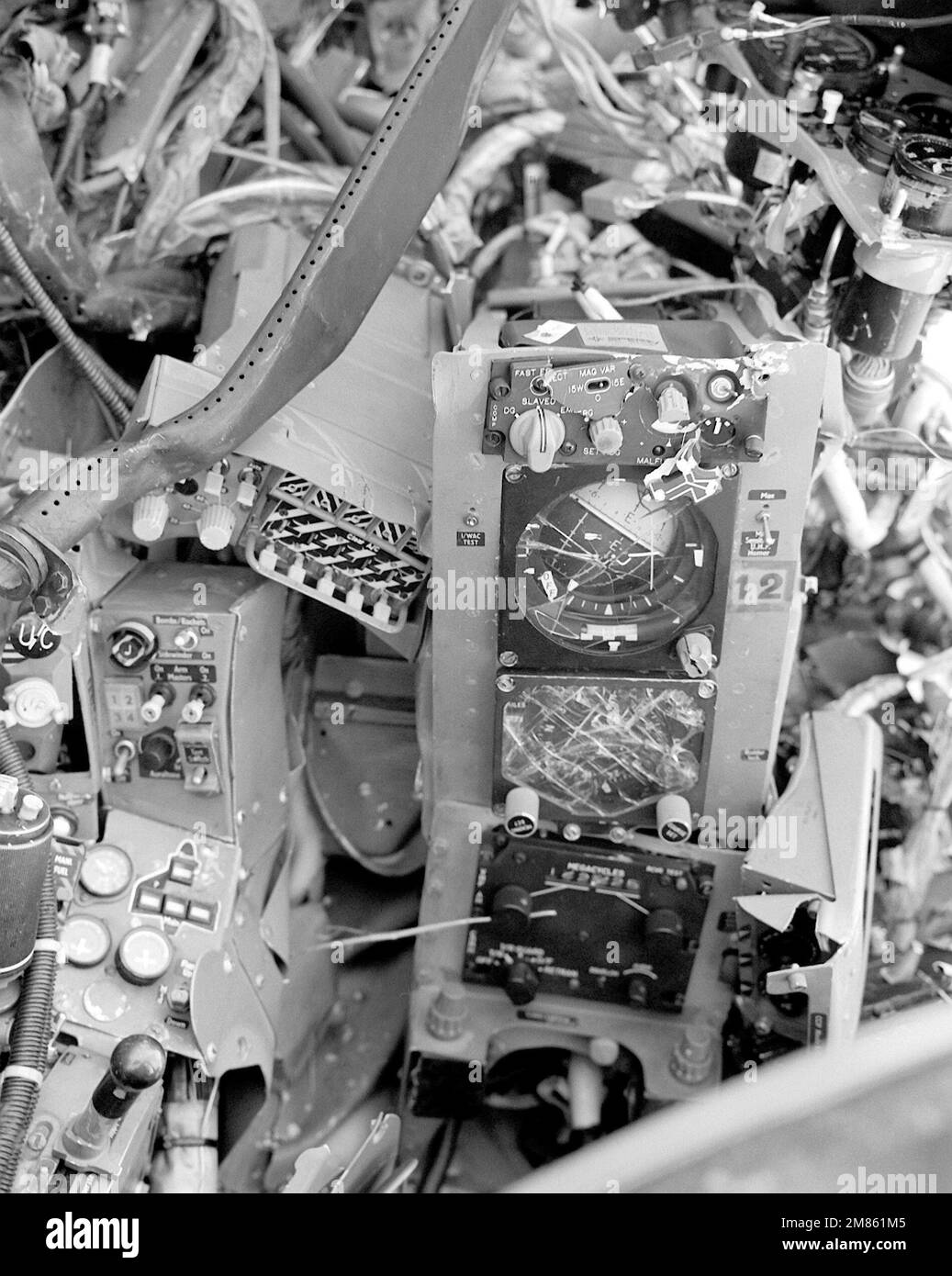 A close-up view of instrument panel and related damage insdie the ...