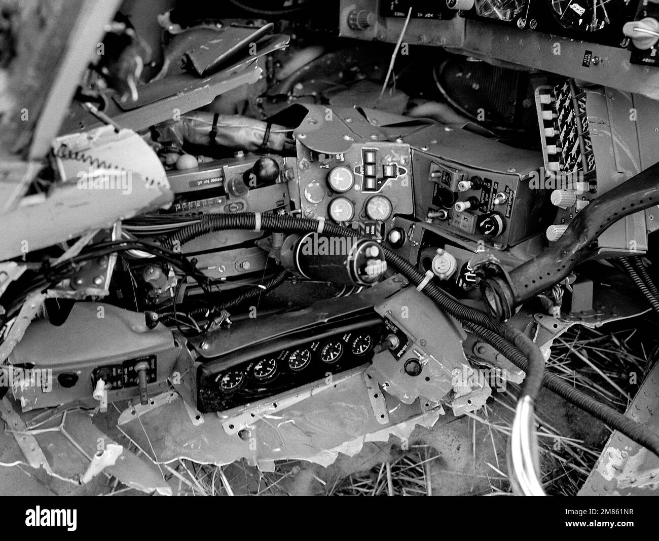 A close-up view of instrument panel and related damage inside the ...