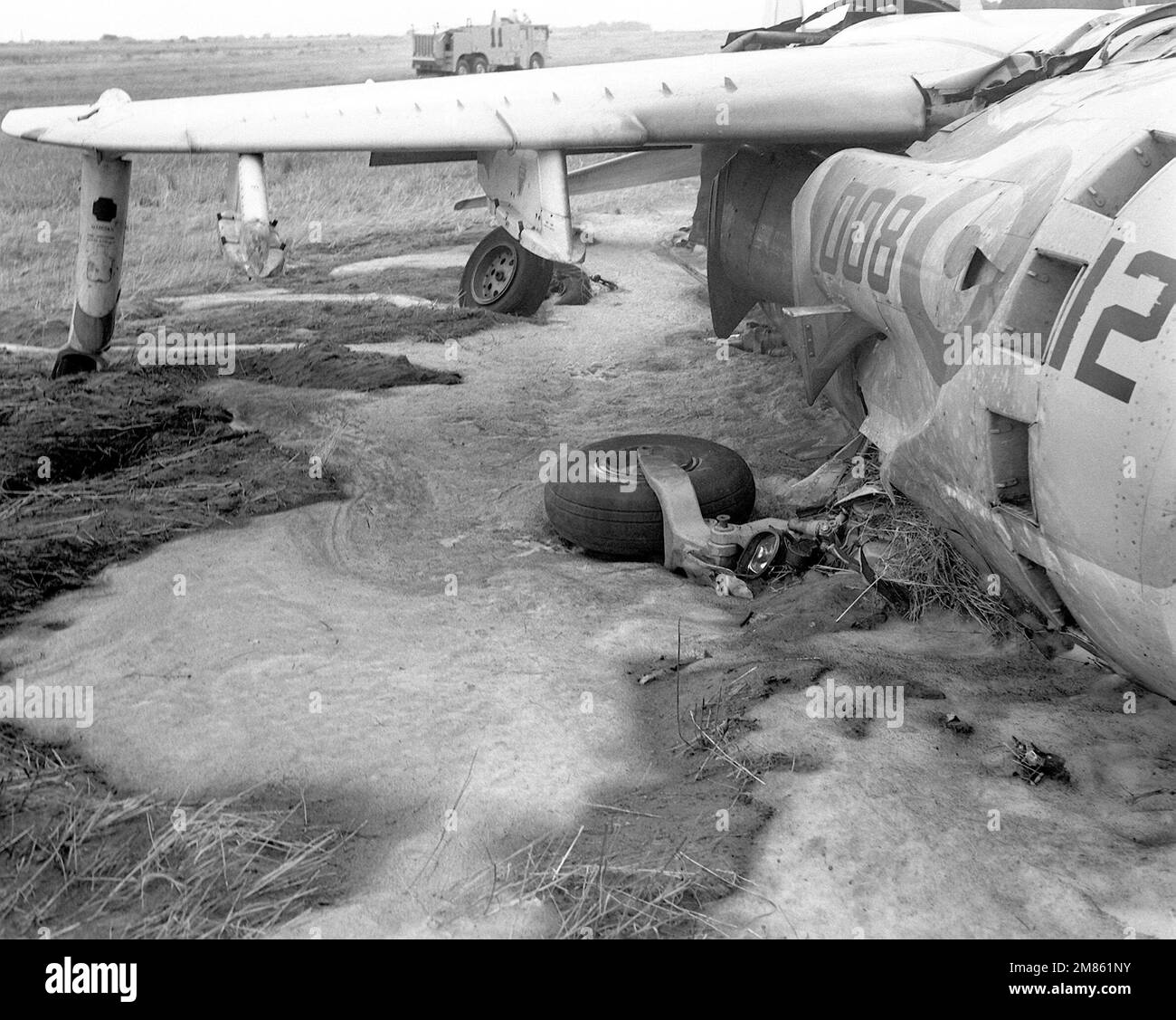 A collapsed nosewheel assembly lies beside the fuselage of a Spanish AV ...