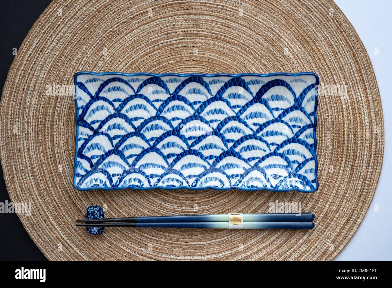 Japanese or Chinese table setting with traditional table mat and ...