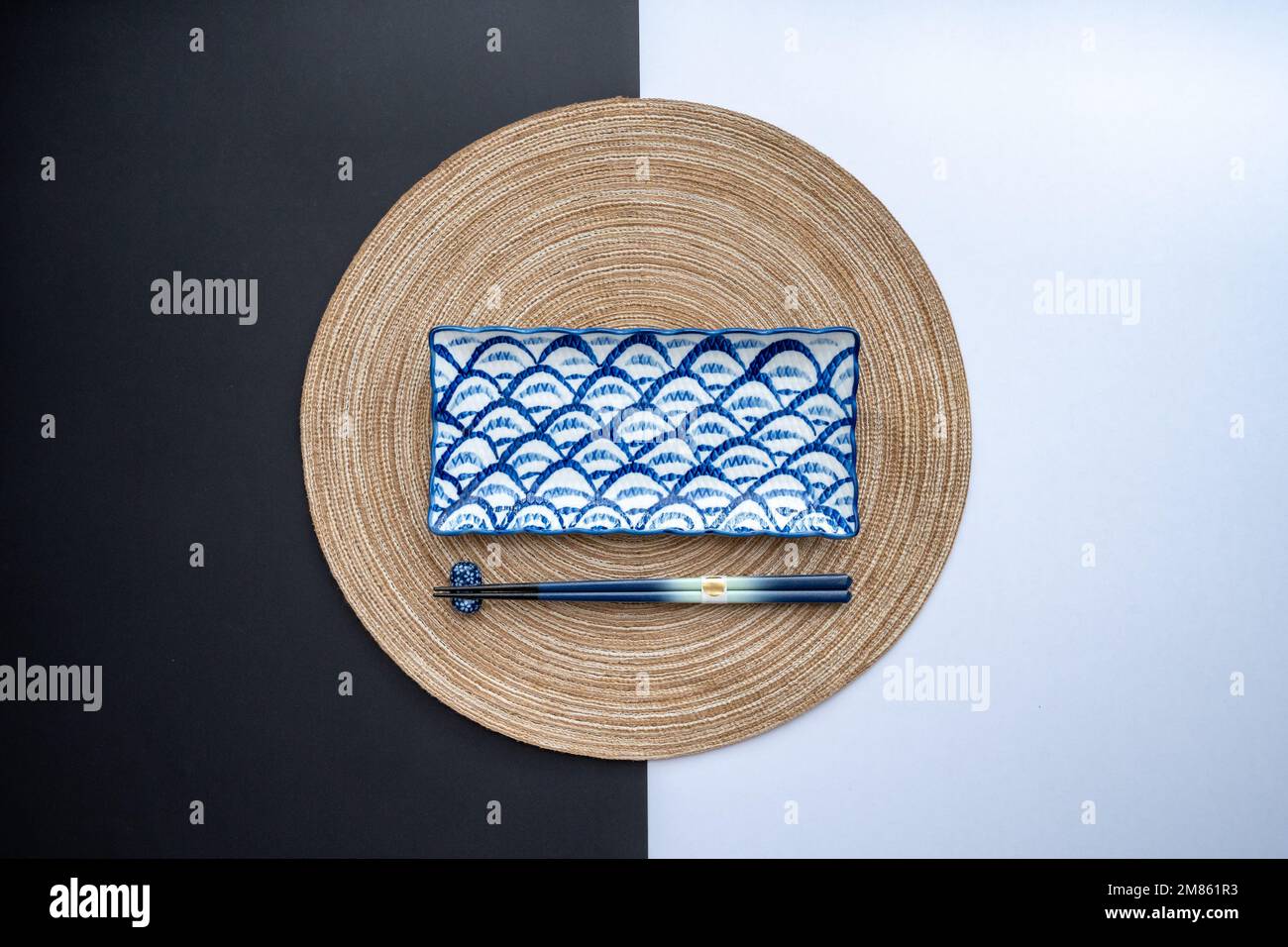 Japanese or Chinese table setting with traditional table mat and ...