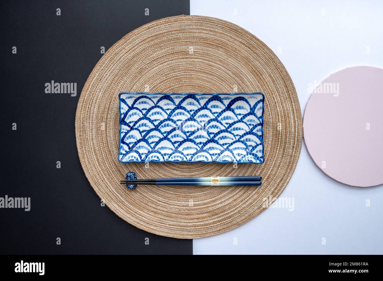 Japanese or Chinese table setting with traditional table mat and ...