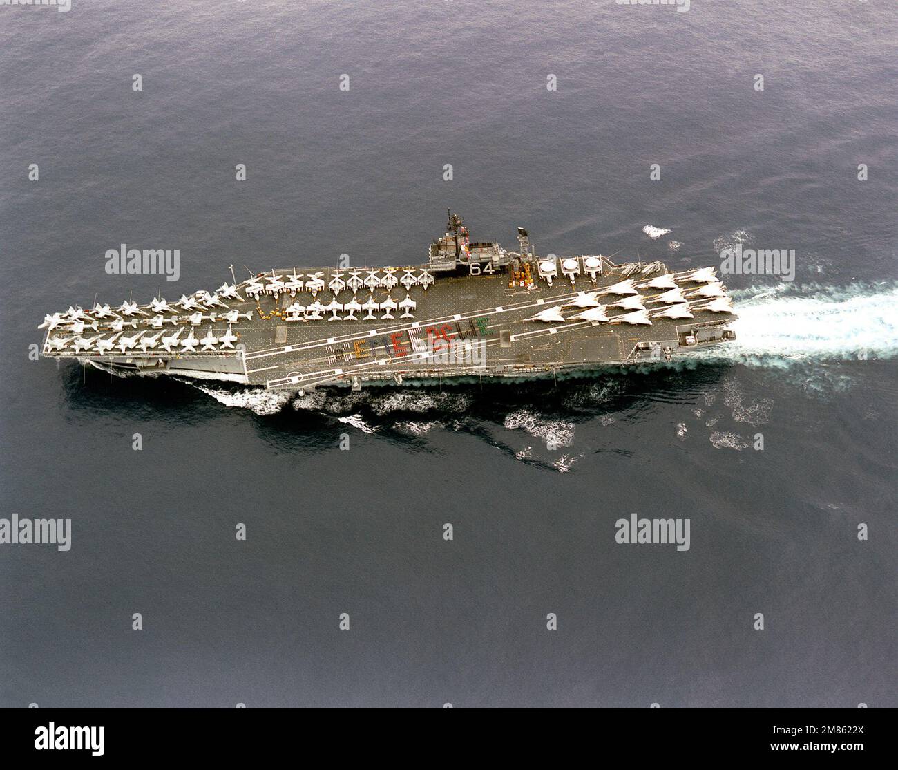 An aerial port beam view of the aircraft carrier USS CONSTELLATION (CV ...