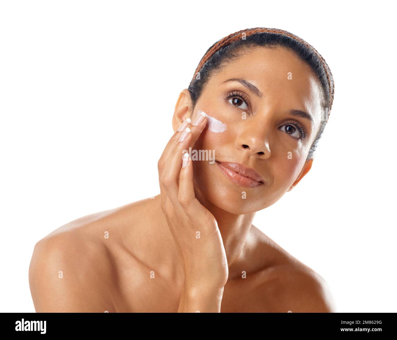 Face, beauty cream and skincare of woman in studio on a white ...
