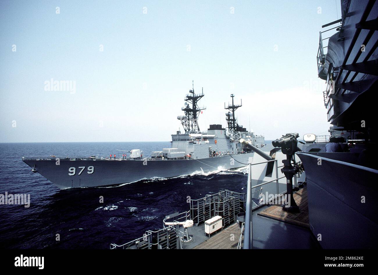 A port bow view of the destroyer USS CONOLLY (DD-979) participating in an underway replenishment ...