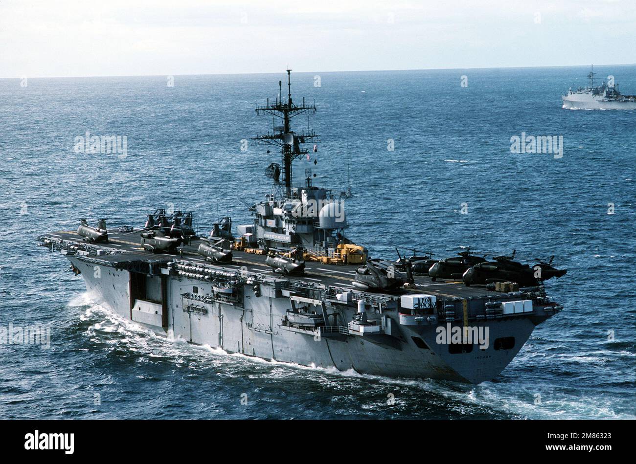 A port quarter view of the amphibious assault ship USS INCHON (LPH-12 ...