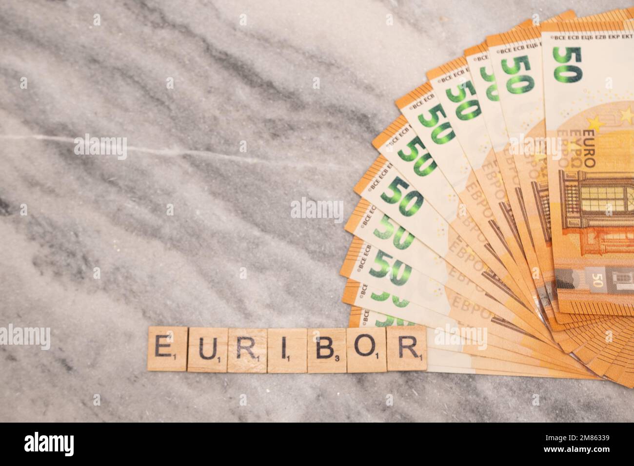 Word EURIBOR Is Written In Wooden Letters, Near Part Of 50 Euro ...