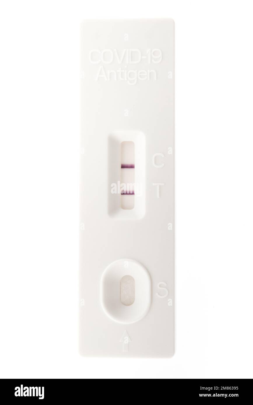 Covid-19 positive test result by using rapid test cassette Stock Photo ...