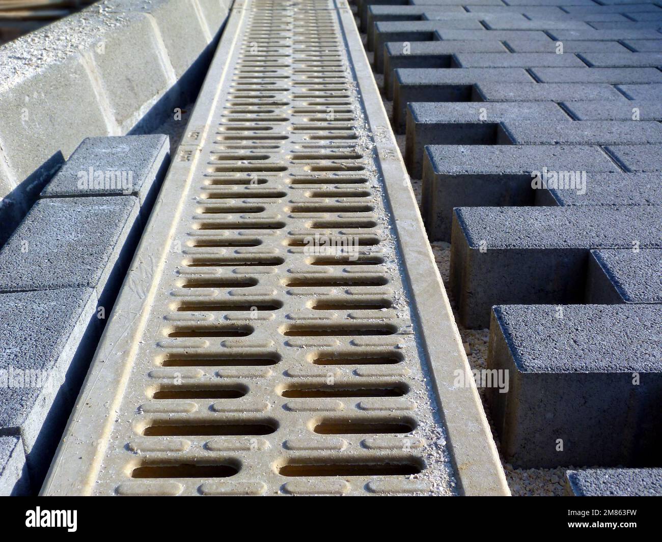 ceramic storm drain trench grating close-up detail during construction ...
