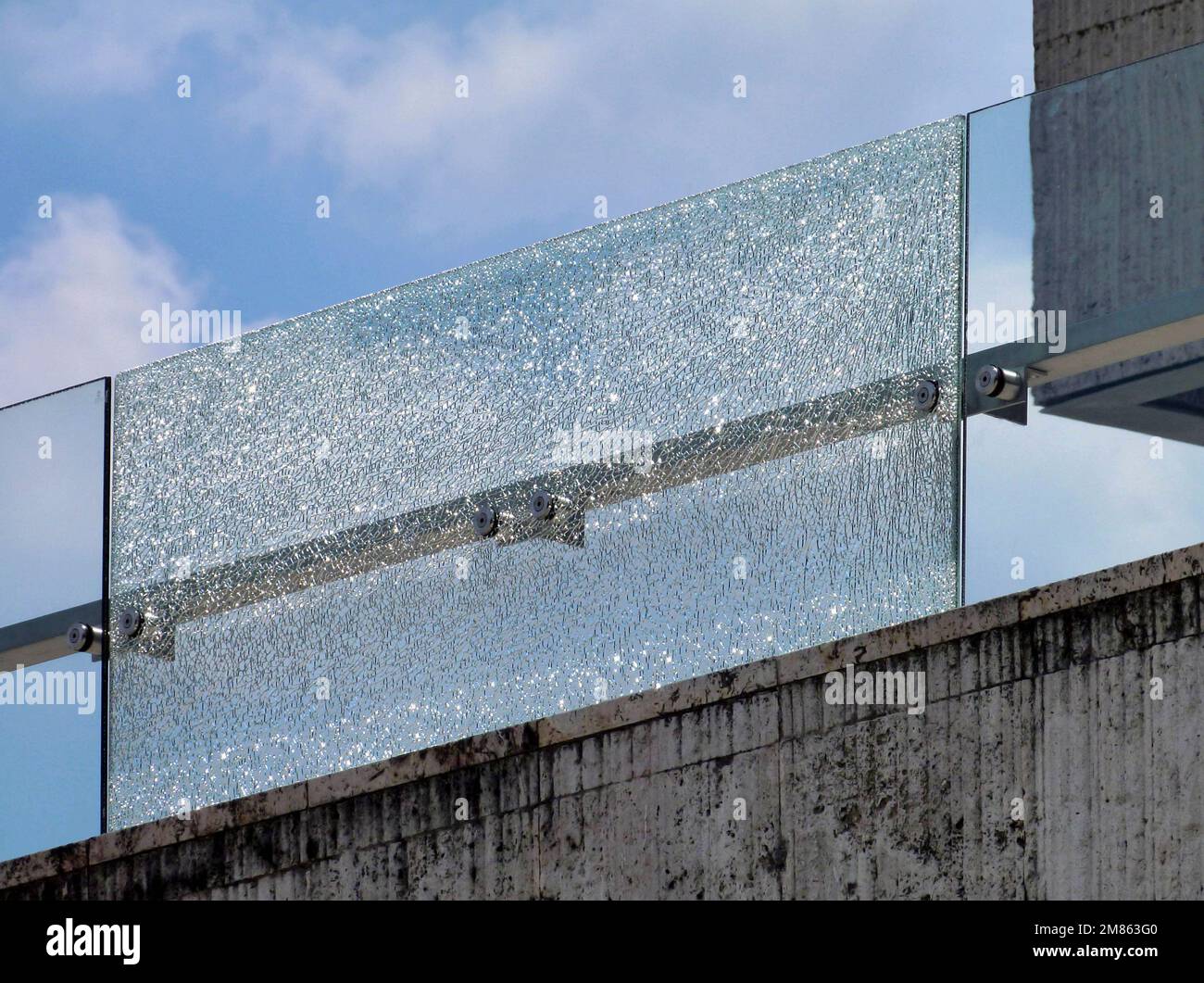 shattered glass balustrade railing. laminated safety glass. stone ...