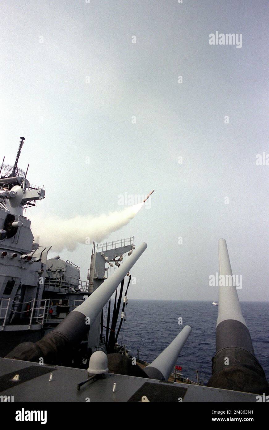 A BGM-109 Tomahawk cruise missile is launched from the battleship USS ...