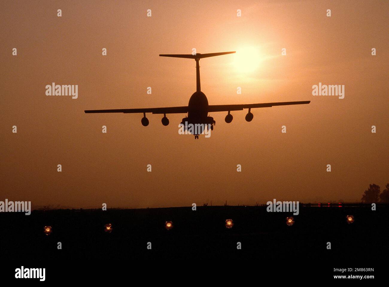 A 63rd Military Airlift Wing (63rd MAW) C-141B Starlifter aircraft ...