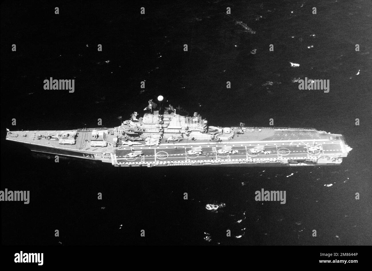A high angle port beam view of the Soviet aircraft carrier KIEV (CVHG ...