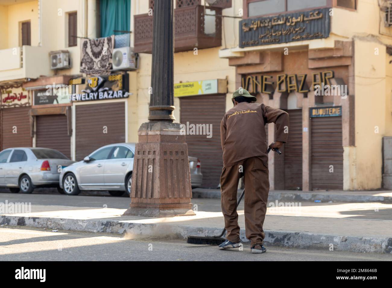 LUXOR, EGYPT - 27 Dec 2022. Unrecognizable arab muslim man working in ...