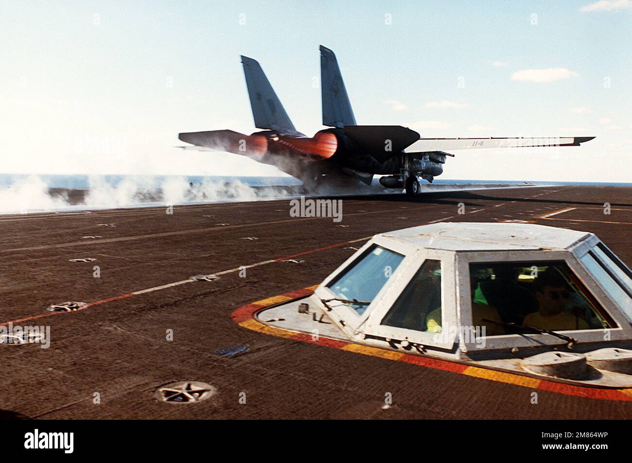 An F-14A Tomcat aircraft is launched from the nuclear-powered aircraft ...
