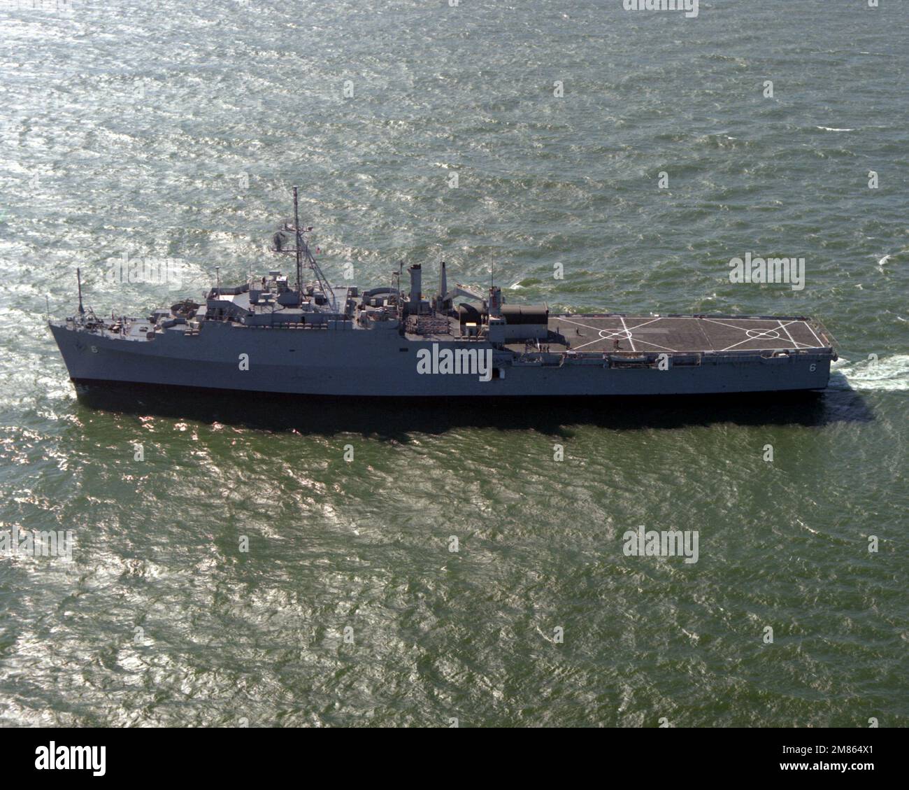 An elevated port beam view of the amphibious transport dock USS DULUTH ...