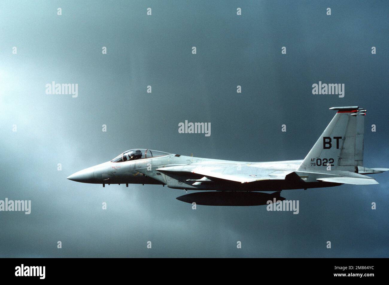 An air-to-air left side view of a 36th Tactical Fighter wing F-15C ...