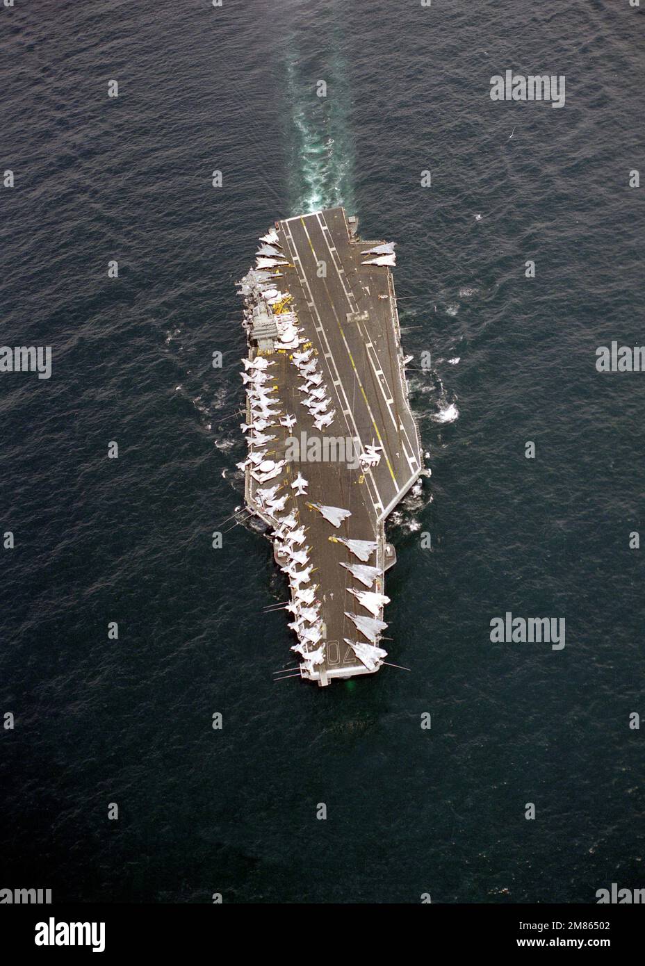 An elevated bow view of the nuclear-powered aircraft carrier USS CARL ...