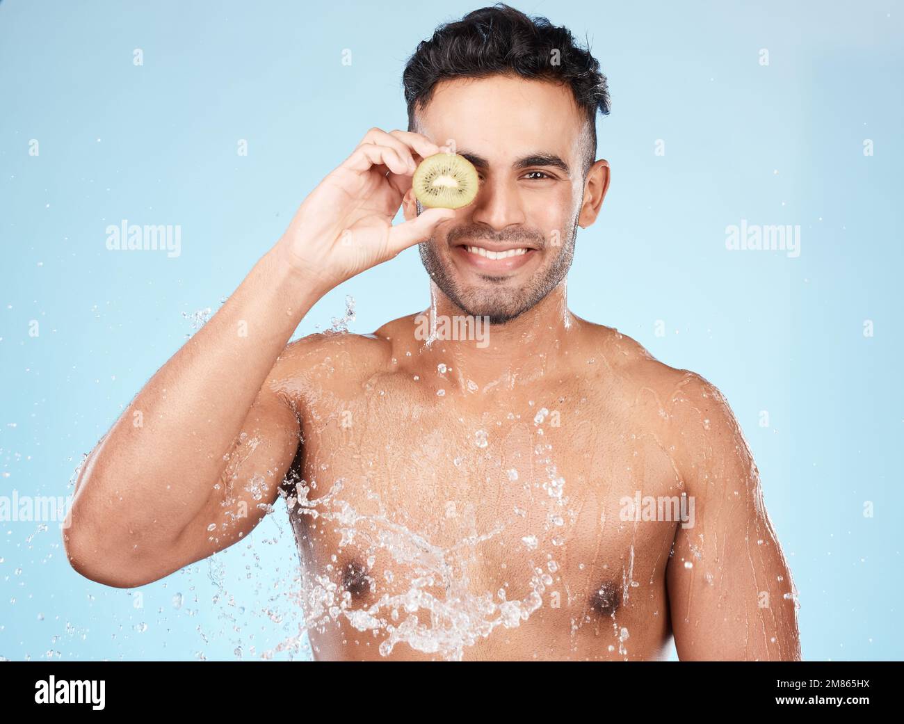 Skincare, beauty and water splash, man with fruit for vitamin c facial ...
