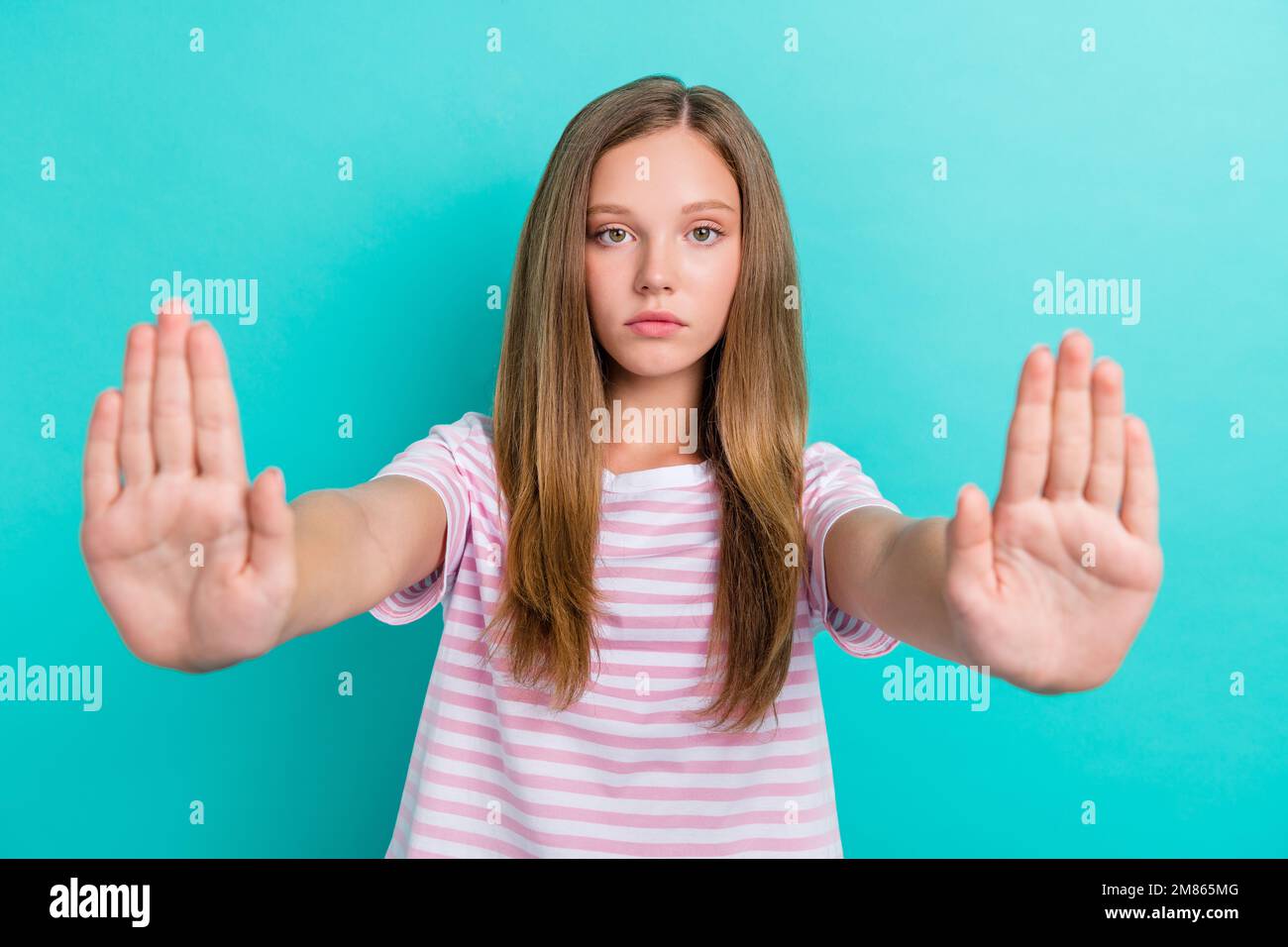 Serious girl saying stop isolated hi-res stock photography and images ...