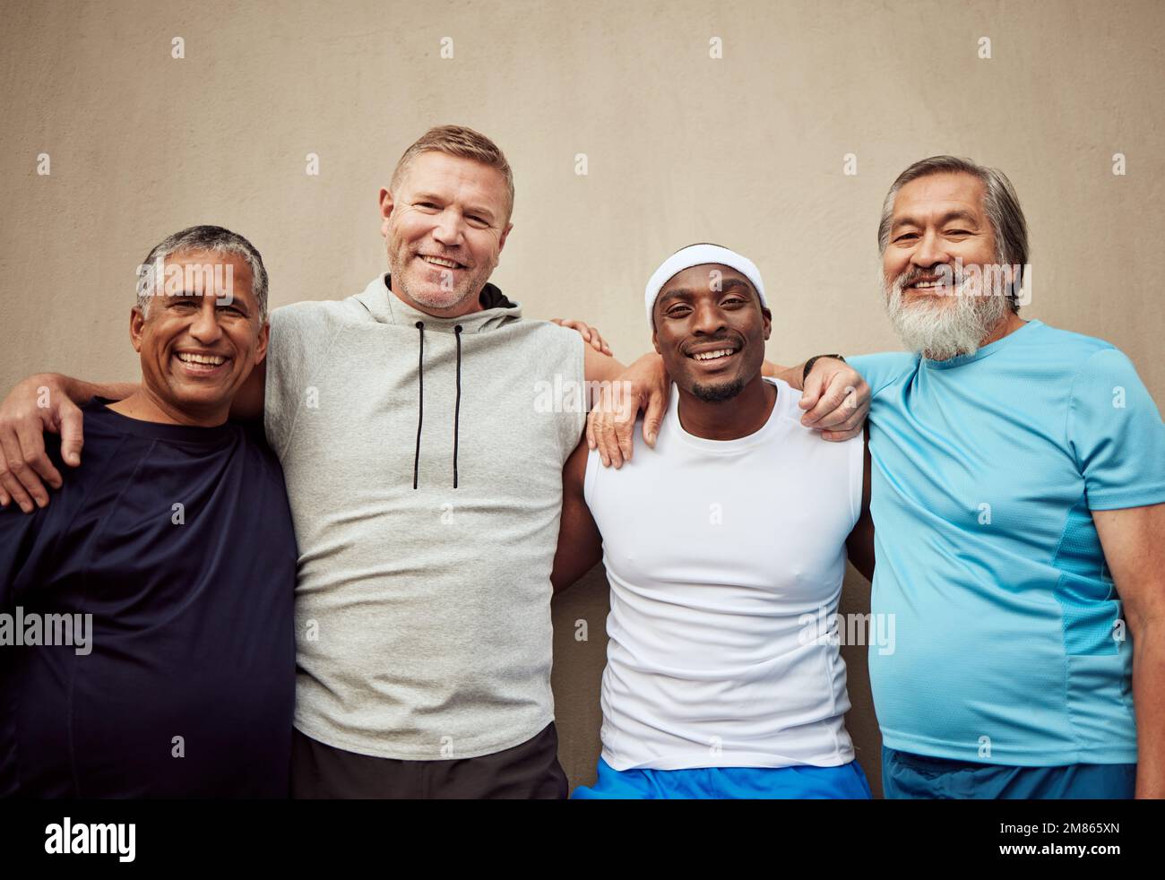 Happy men, exercise group and portrait in city on wall background ...